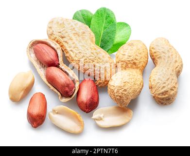 Peanuts whole and cracked isolated on white background. Clipping path ...