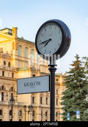 A picture of the Krakow clock on the Holy Spirit Square Stock Photo - Alamy