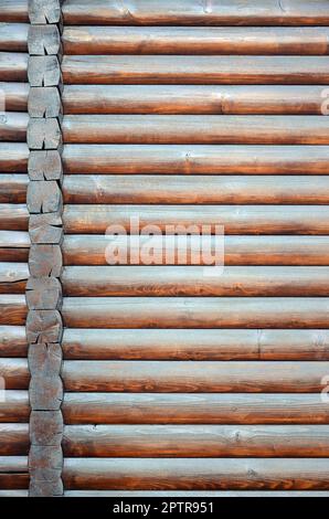 Hewn timber. Rustic log wall horizontal timber background. Fragment of ...