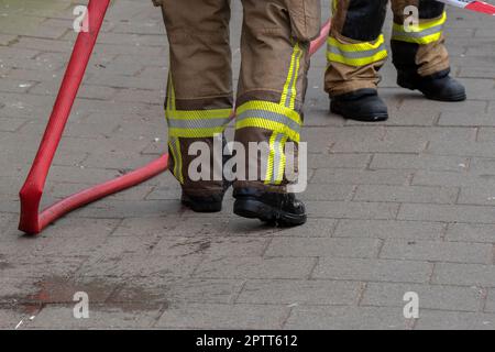Feet Of Fire Department Employees At Work At Amsterdam The Netherlands ...