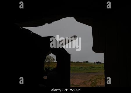 Gun at a bunker at the Atlantic wall in Longues-sur-Mer, Normandy ...