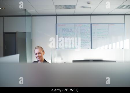 Ive got my own space. Portrait of an attractive young woman standing in her office cubicle Stock ...