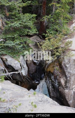 A clump of rusty snow in the ice caves at the Grottos in White River ...