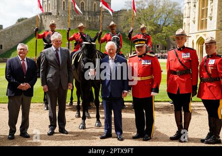 King Charles III (centre) alongside Ralph Goodale, the High ...