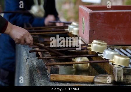 People performing ablutions, ceremonial purification rite known as ...