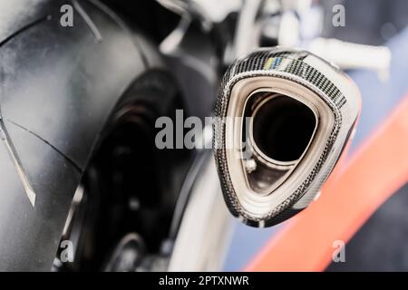 Close up shot of a motorcycle carbon exhaust pipe Stock Photo - Alamy