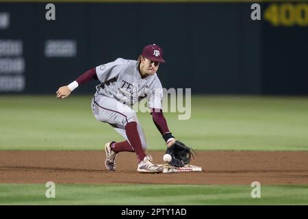 Hunter Haas (2) of the Texas A&M Aggies walks to first base after ...