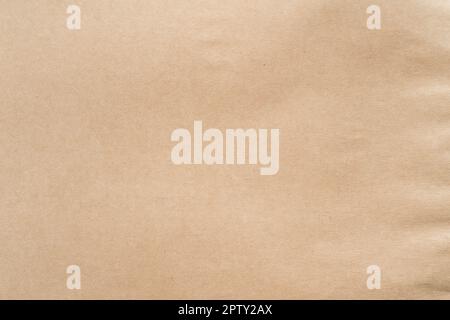 Beige packaging paper. Ecological production, canvas texture, recycling ...