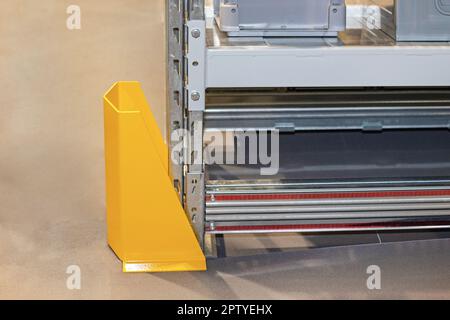 Bright Yellow Racking Corner Post Protector in Warehouse Stock Photo ...