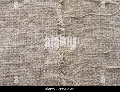 Gray linen fabric with frayed edges with thread Stock Photo - Alamy