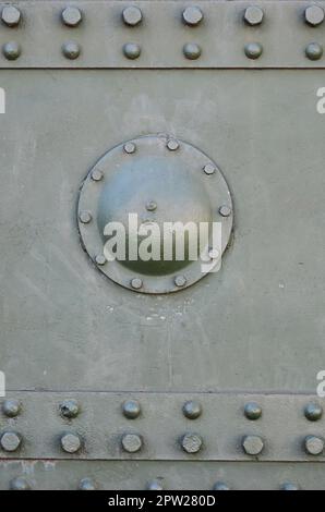 The texture of the wall of the tank, made of metal and reinforced with ...