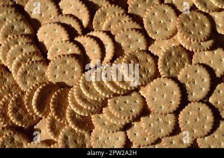 Closeup of salted crackers. Background image of classic salty cracker ...