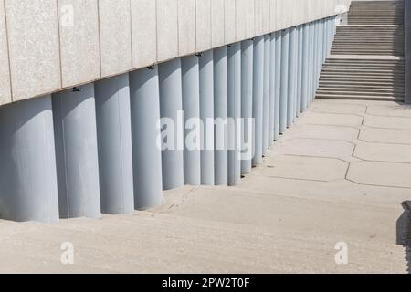 Embankment stairs and industrial style concrete columns Stock Photo - Alamy