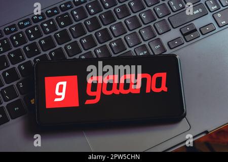 In this photo illustration, the Gaana logo is displayed on a smartphone ...