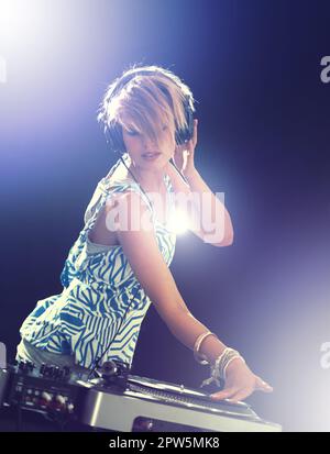 Shes in her happy place. an attractive young woman looking thoughtful ...