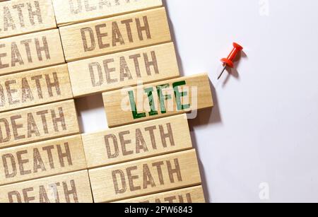 Term life insurance words written on ripped paper with pink background ...