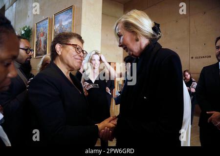 Elizabeth Riordan, left, wife of Mayor Richard Riordan, receives a ...
