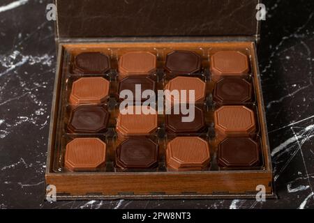 Packed madlen chocolate. Milky and bitter square shape chocolate. Gift ...