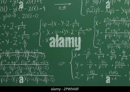 Many different math formulas written on chalkboard Stock Photo - Alamy