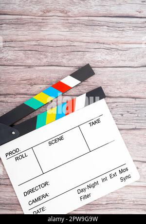 Movie clapper on wooden background Stock Photo - Alamy