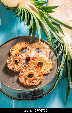 Some homemade Dried Pineapple Rings on table Stock Photo - Alamy