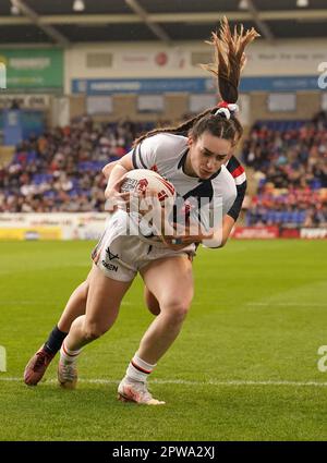 England's Leah Burke goes over for a try during the women's mid-season ...
