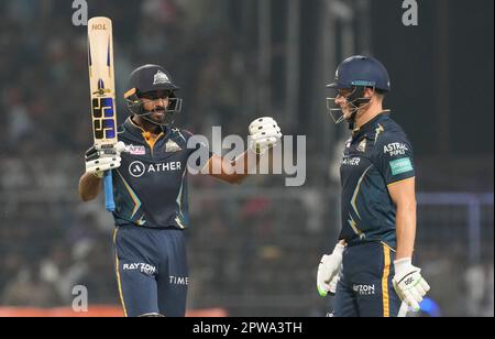 Gujarat Titan's David Miller watches the ball after playing a shot ...
