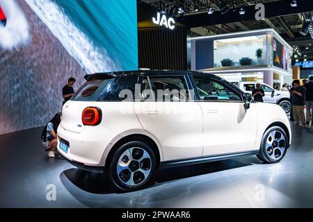 JAC Yiwei 3, exported as E30X, a small electric hatchback on display at ...