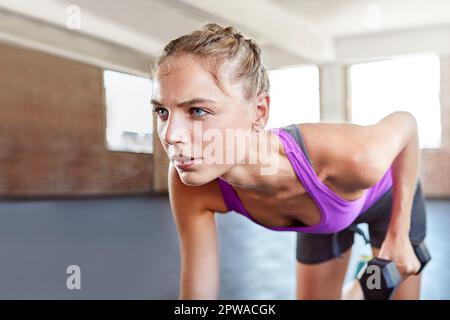 Be mentally stronger than what you physically feel. a young woman ...