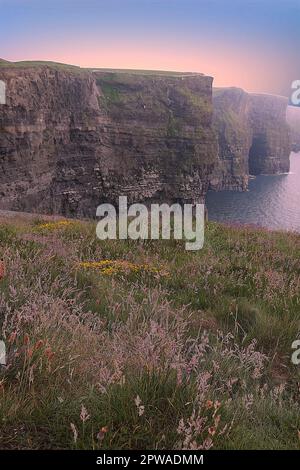 Cliffs of Moher are located on the Rugged west Clare Coast in Ireland ...