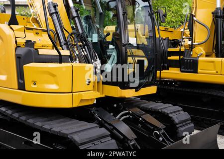 Fleet of yellow construction machines. High quality photo Stock Photo ...