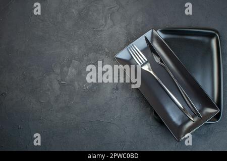 top view long black plates on dark background glass horizontal food ...