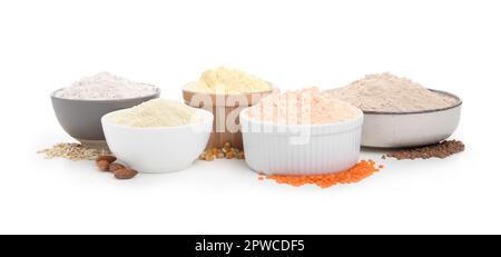 Different types of flour in bowls and ingredients on white background ...