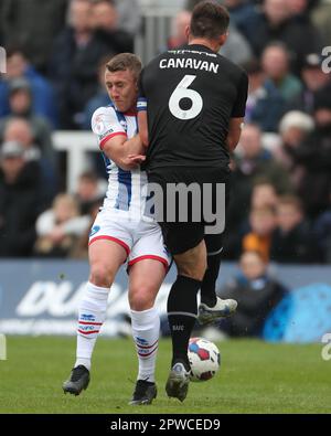 David Ferguson of Hartlepool United battles with Levi Lumeka of Oxford ...