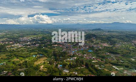 Aerial view of Berastagi town among farmlands in the beautiful Karo ...