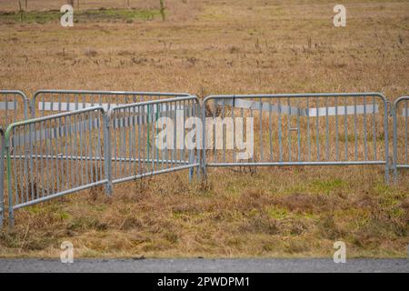 Temporary metal fence blocking off at a construction site Stock Photo ...