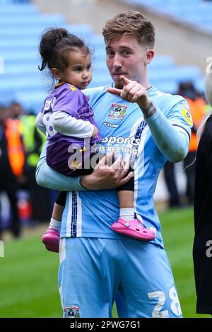 Coventry City's Josh Eccles and family on the pitch at the end of the ...