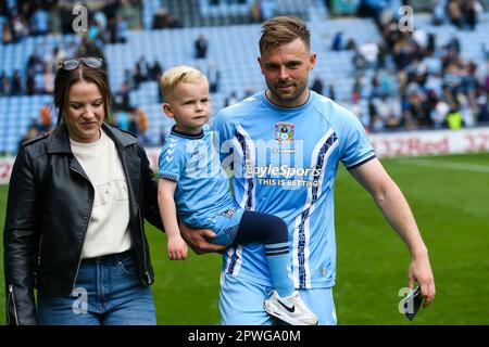 Coventry City's Matthew Godden and his family on the pitch at the end ...