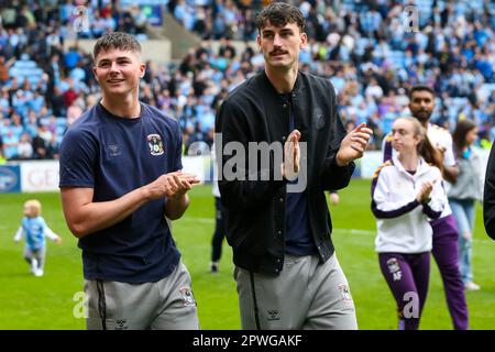Coventry City's Ryan Howley (left) and Gustavo Hamer applaud the fans ...