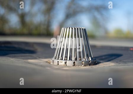 Clean metal caged roof drain on a flat EPDM roof Stock Photo - Alamy