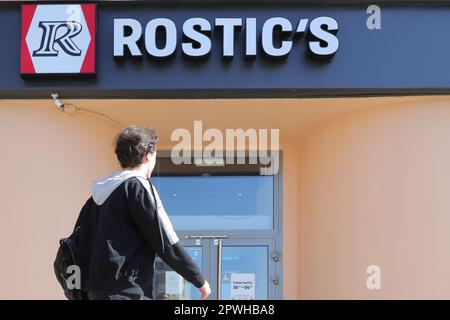 April 04.2023. Russia. Moscow. A man at the fast food restaurant Rostic ...
