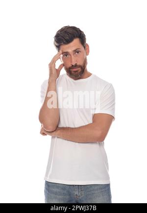 Embarrassed man in shirt on white background Stock Photo - Alamy