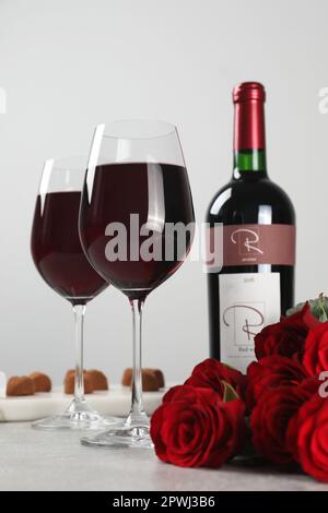 Delicious chocolate wine bouquet roses Stock Photo - Alamy