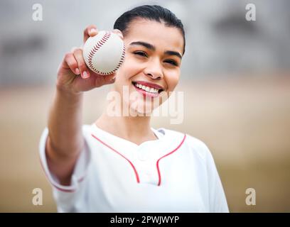 Time for a curve ball. Cropped portrait of an attractive young female ...