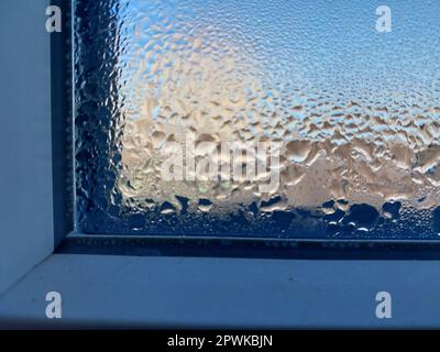 Window covered with frozen drops of the condensate water Stock Photo ...
