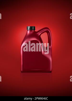 Gallon of engine oil on a dark red background Stock Photo - Alamy