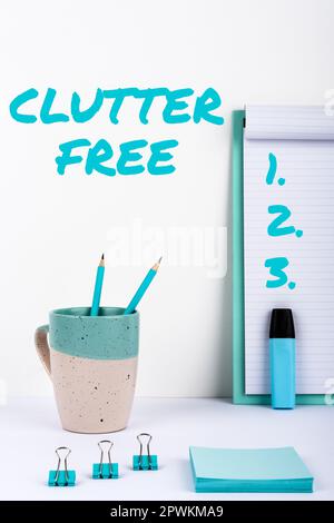 Hand writing sign Clutter Free. Business idea Well organized and ...