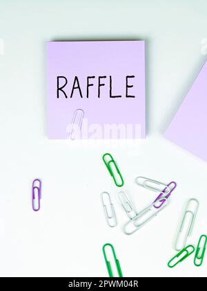 Text caption presenting Raffle, Concept meaning means of raising money ...