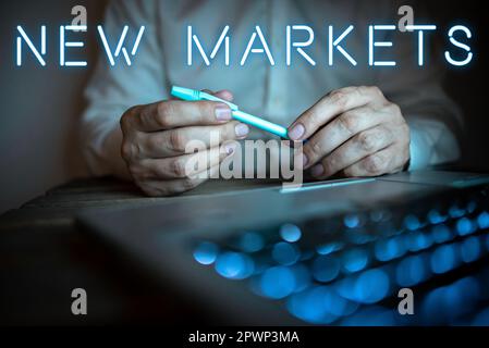 Hand writing sign New Markets, Business concept Different commercial ...