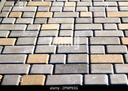 Yellow stone tiles masonry closeup background. the texture of yellow ...